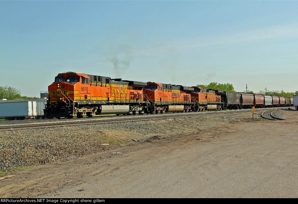 BNSF 5618 Heads up a Wb grain train out of town.